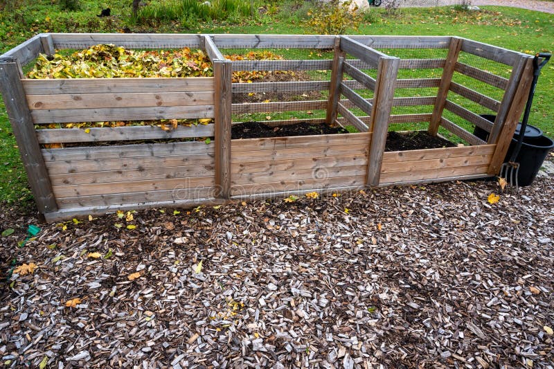 Garden Compost with One Compartment Full of Leaves Stock Photo - Image ...