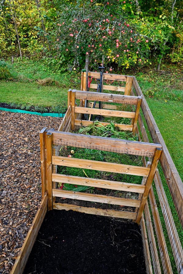 Garden Compost with Three Compartments in Garden Stock Image - Image of ...