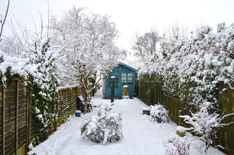 Garden Covered with Snow stock image. Image of fence - 70454039