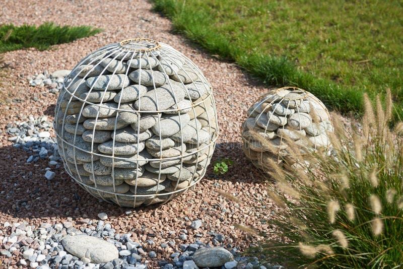 Garden Design with Stone Balls from Pebbles Stock Photo - Image of ...