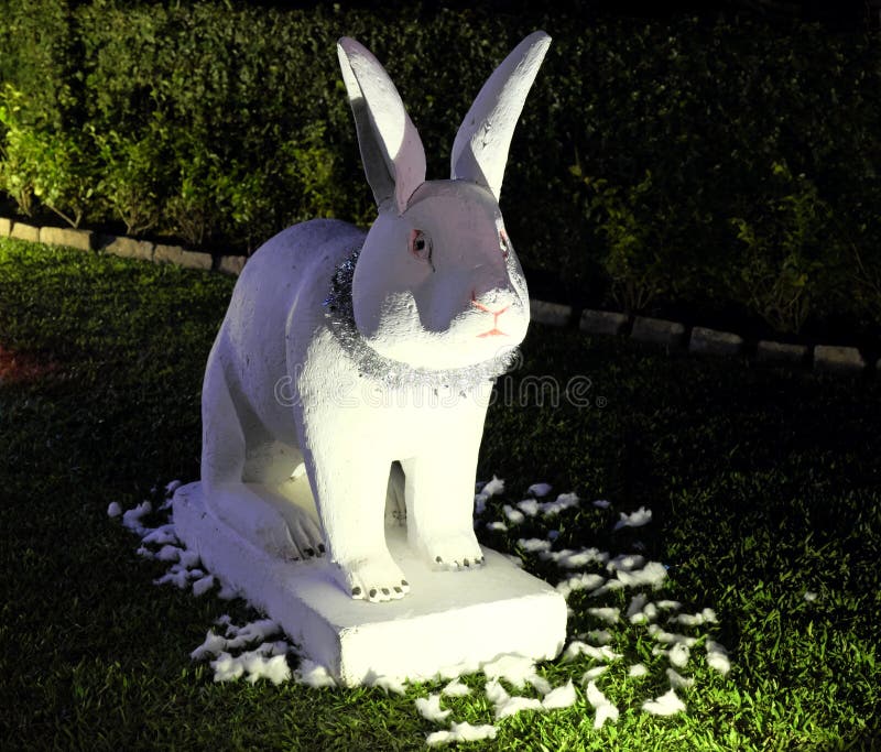 Garden Figure in the Form of a White Rabbit. White Rabbit on a Green ...