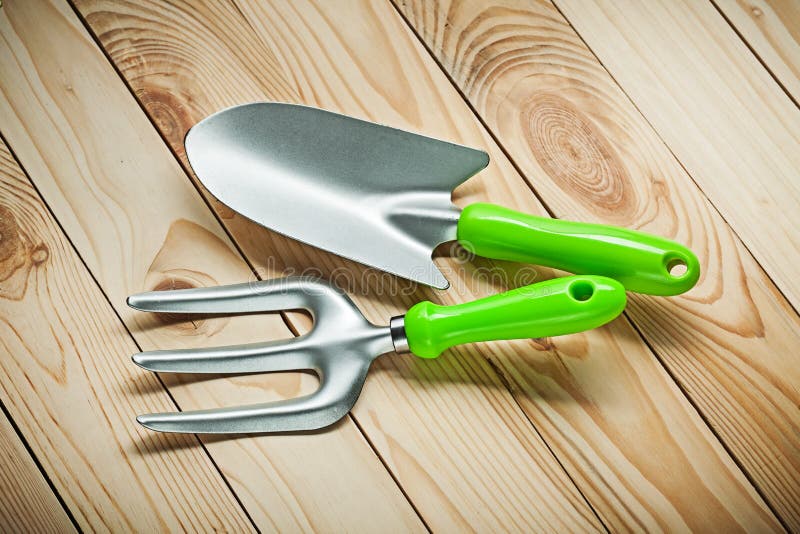 Garden Fork and Hand Spade on Wood Stock Photo - Image of articles ...