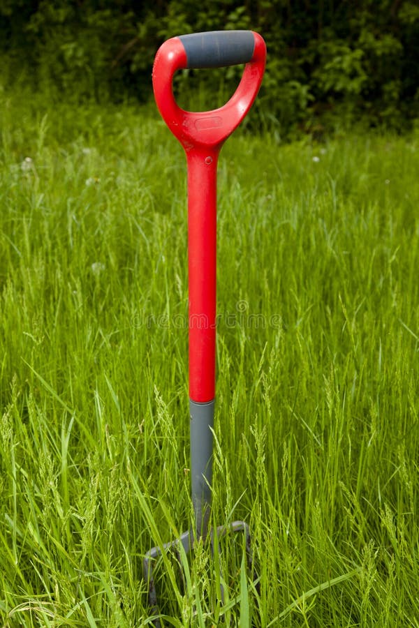 Garden Fork in an Overgrown Garden Stock Image - Image of lawn, green ...