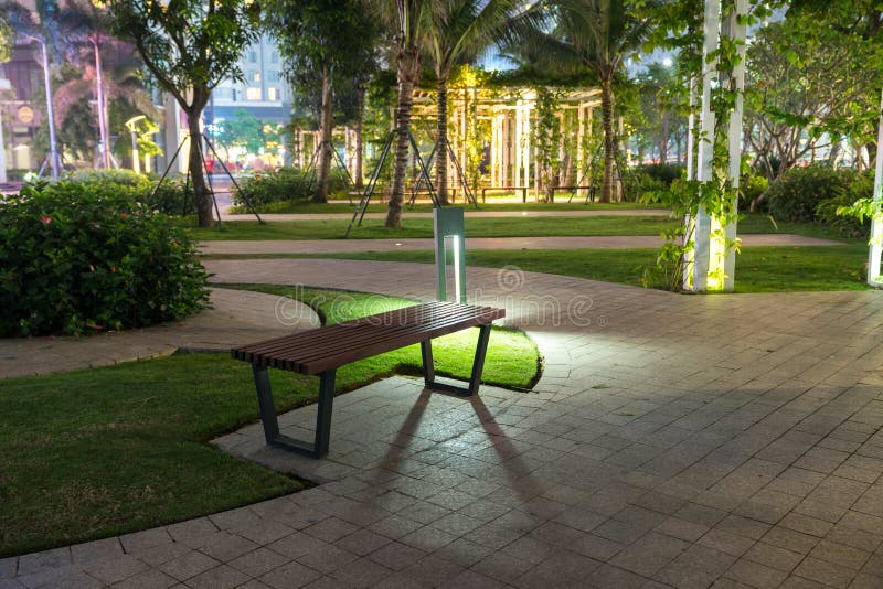 Garden Glowing Decoration Light in the Park at Night with Park Bench ...