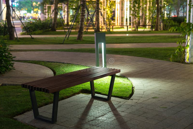 Garden Glowing Decoration Light in the Park at Night with Park Bench ...