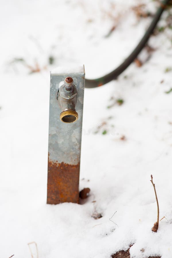 Garden Hose and Spout in the Snow Stock Image - Image of hose, pattern ...