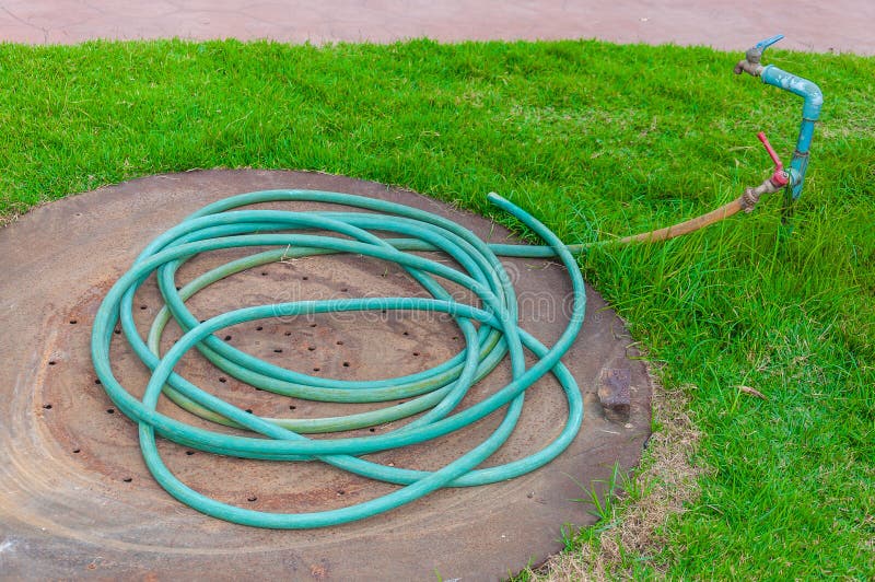 Garden Hose stock image. Image of pipe, sprinkle, water - 66660407