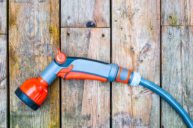 Garden hose stock image. Image of sprayer, rubber, sprinkle - 65245937