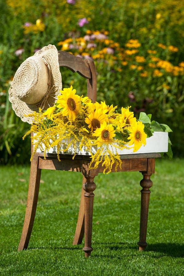 Garden idyll stock image. Image of flowers, garden, chair - 34361795