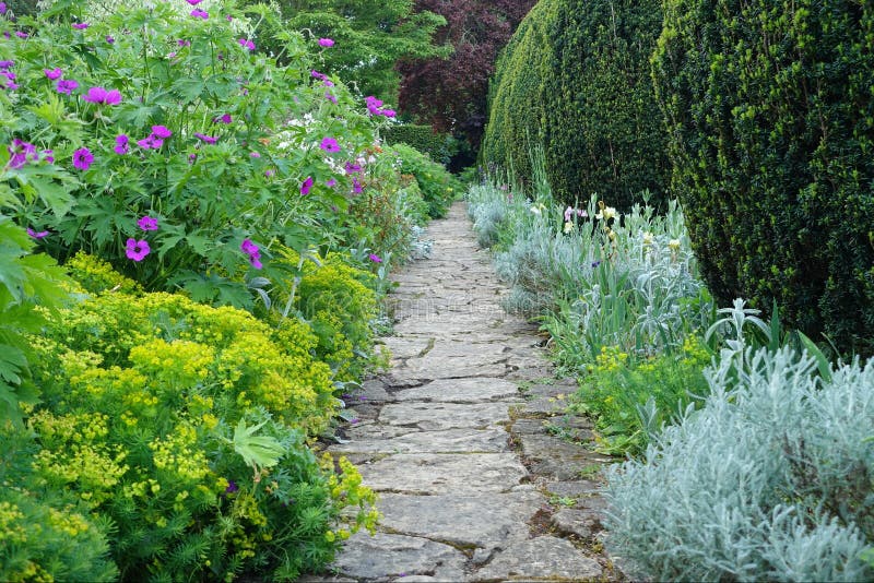 Garden Path and Flower Bed stock image. Image of english - 238169583