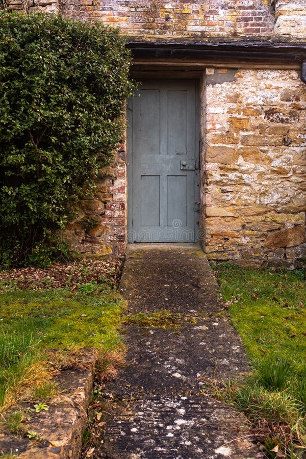 A Garden Path Leading To a Door in a Walled Garden Stock Photo - Image ...