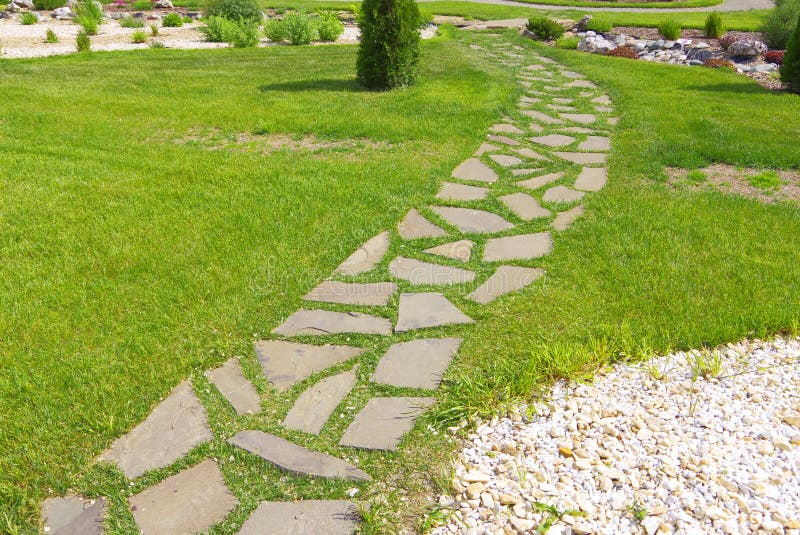 Garden Path Made of Flat Stone among Green Grass Stock Image - Image of ...