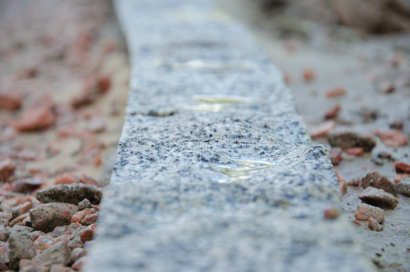 Garden Path with Natural Stone Slabs and Edging Made of Stones Stock ...