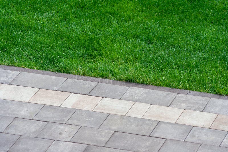 Garden with Pavement Road and Green Grass. Footpath Closeup Stock Photo ...