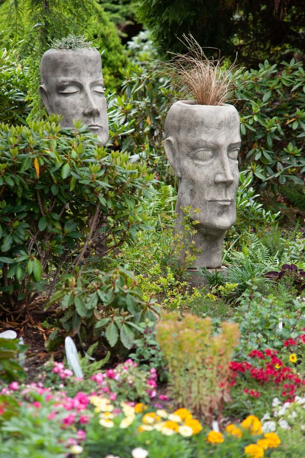 Garden Planters Shaped Like Human Heads with Flowers Stock Image ...