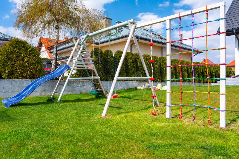 Garden Playground for Children with a Climbing Net Stock Photo - Image ...