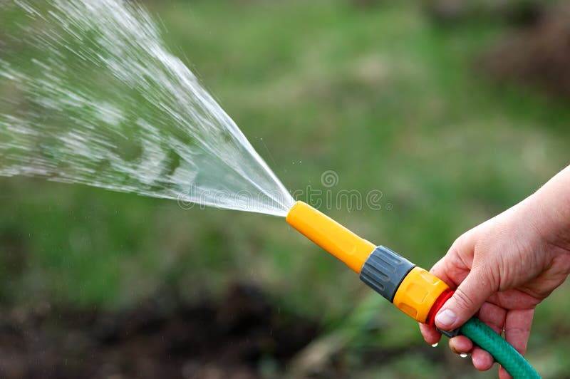 Water sprinkle stock photo. Image of lawn, environment - 10916612