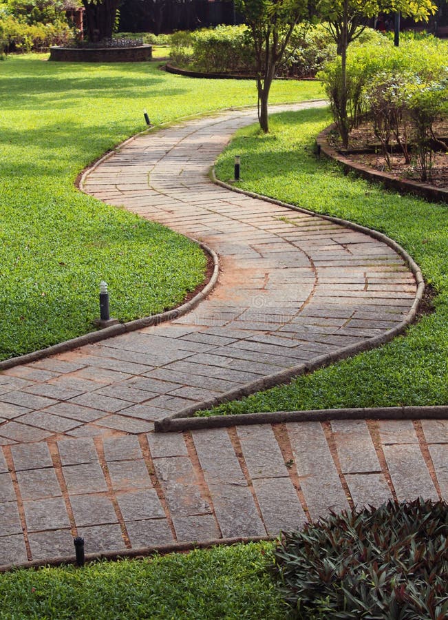 Garden curve stone path stock image. Image of flora, direction - 66276403