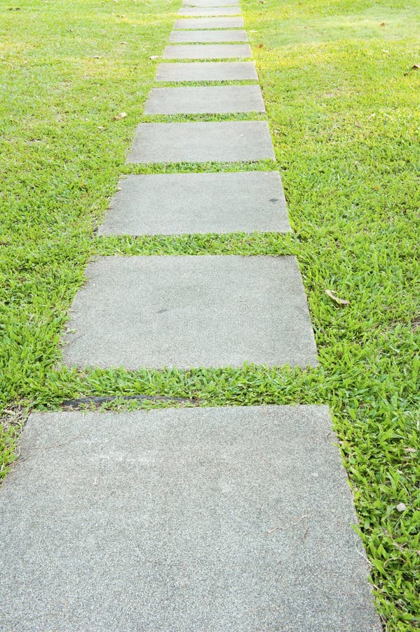 Garden Stone Path with Grass Growing Up Stock Image - Image of ...