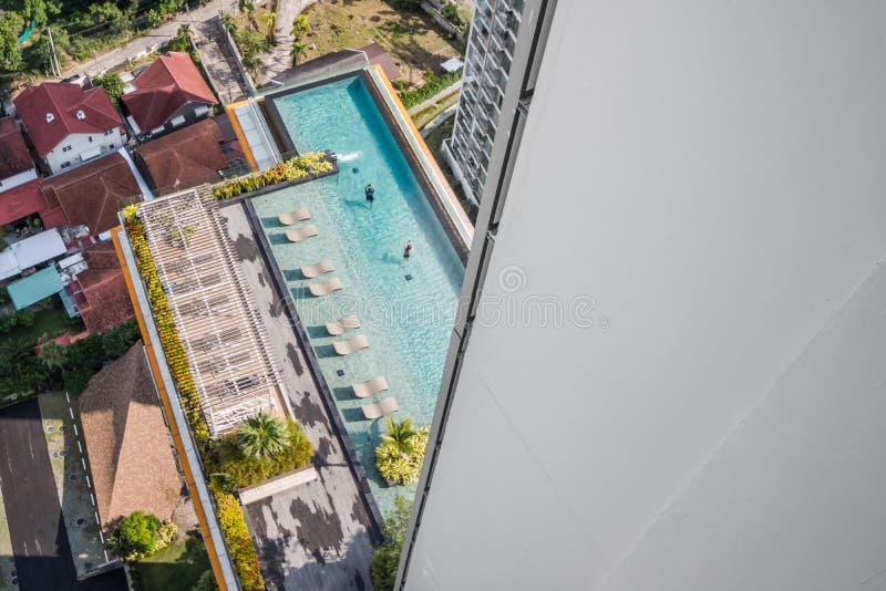 Garden and swimming pool stock photo. Image of condominium - 158725188