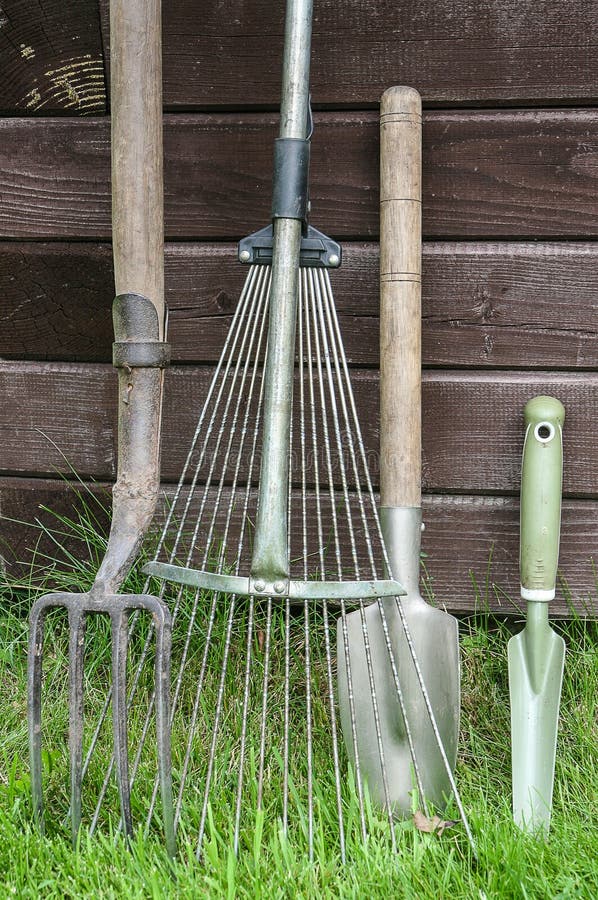 Garden tools on grass stock photo. Image of backgrounds - 40199262