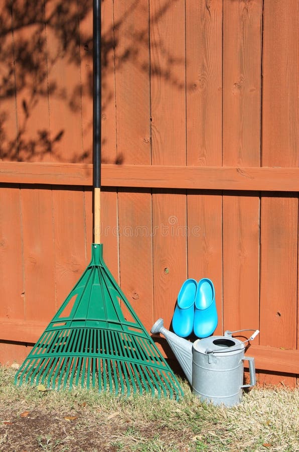 Garden tools on yard stock image. Image of background - 23972073
