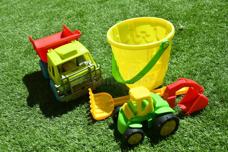 Garden toys over the grass stock image. Image of kids - 151924479