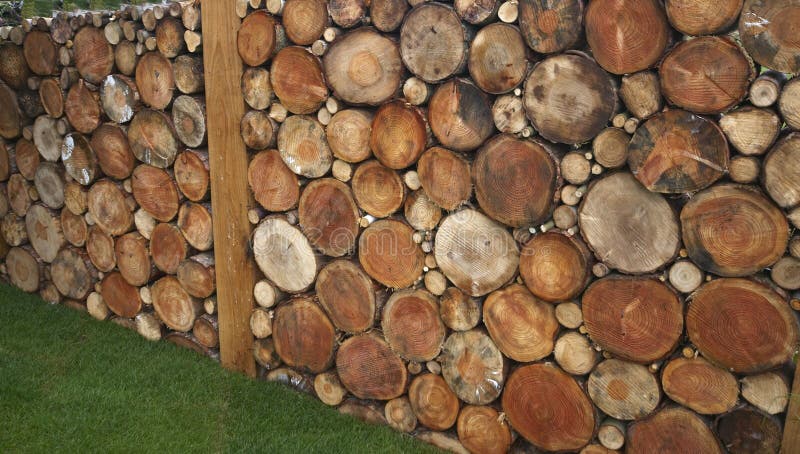A Garden Wall Made with Sliced Logs Stock Image - Image of timber ...