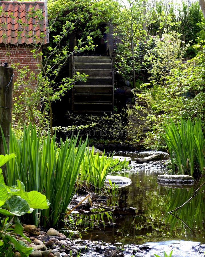 Garden with Water Mill Wheel Stock Photo - Image of flowing, mill: 122018