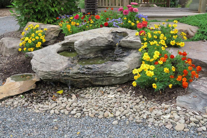 Garden Waterfall and Flowers Stock Image - Image of pink, stone: 36300591