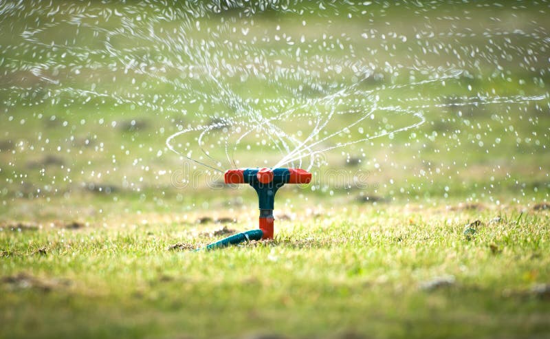 Garden Watering System with Spiral Sprays. Stock Photo - Image of aqua ...