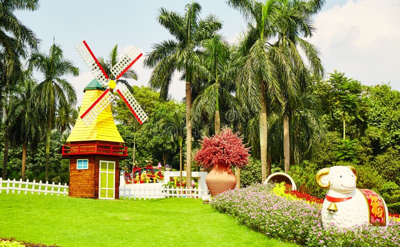 Garden with windmill stock photo. Image of trees, outdoors - 61560700