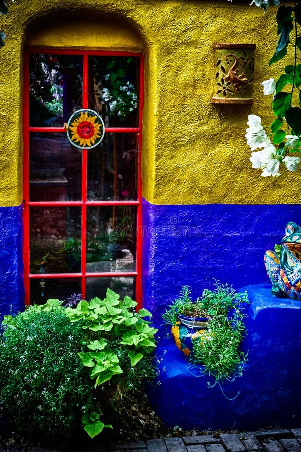 Garden Window in Blue and Yellow Wall Stock Photo - Image of ...