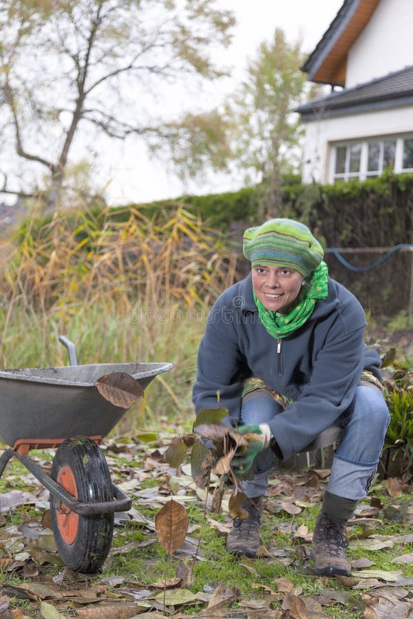 Mature Couple Doing Yard Work Stock Image - Image of human, outdoors ...