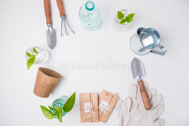 Gardener`s Desk with Garden Tools, Seeds and Tablet Stock Photo - Image ...