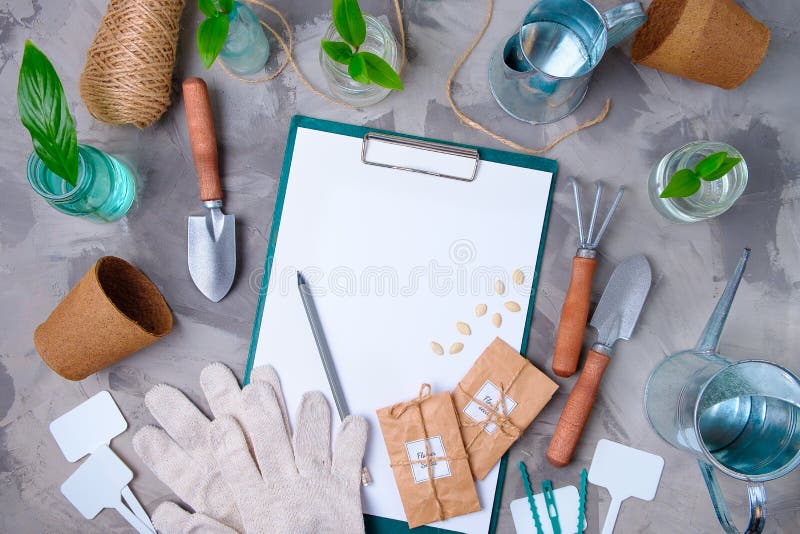 Gardener`s Desk with Garden Tools, Seeds and Tablet Stock Image - Image ...