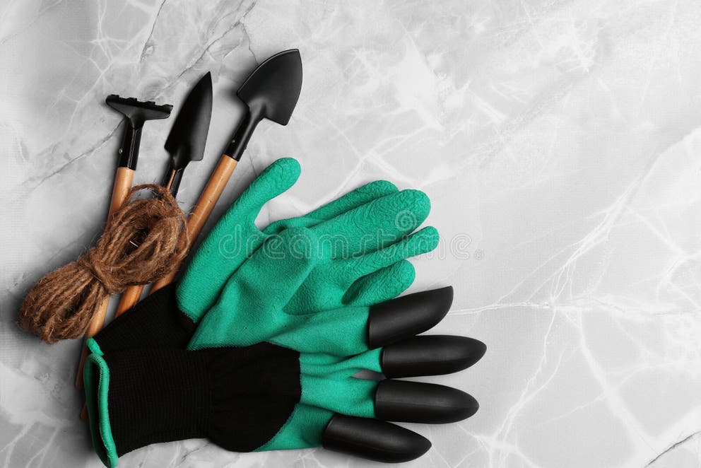 Gardening Gloves, Tools and Thread on Light Grey Marble Table, Flat Lay ...