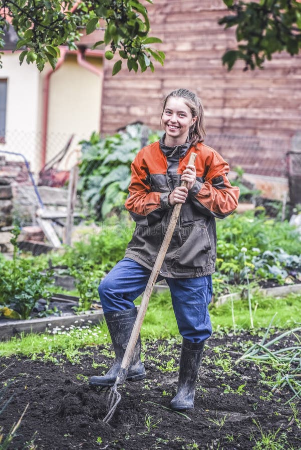 Gardening. Soil Preparing for Planting in Spring. Gardener Digging in ...