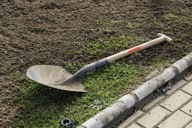 Gardening Spade on Grass and Compost, Ready To the Spring Season Stock ...