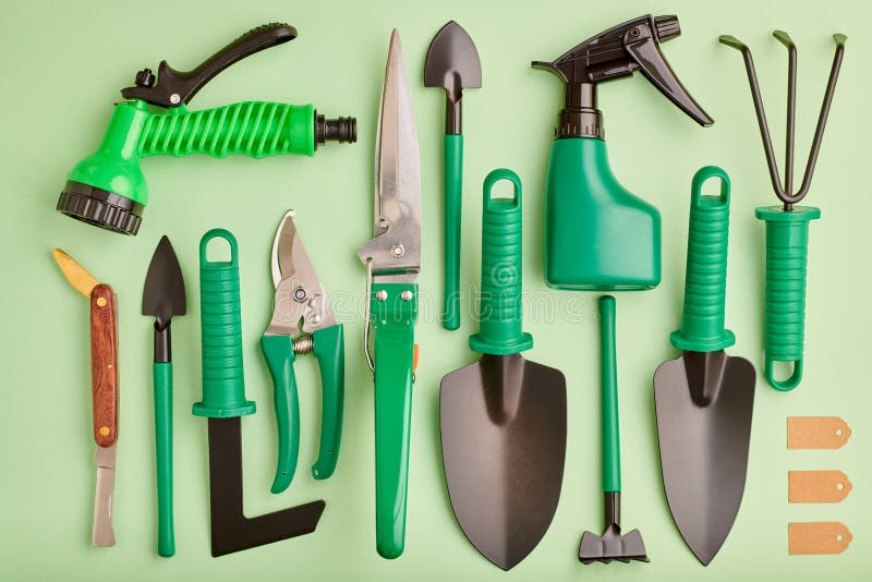 Gardening Tools on Green Background Flat Lay Stock Image - Image of ...