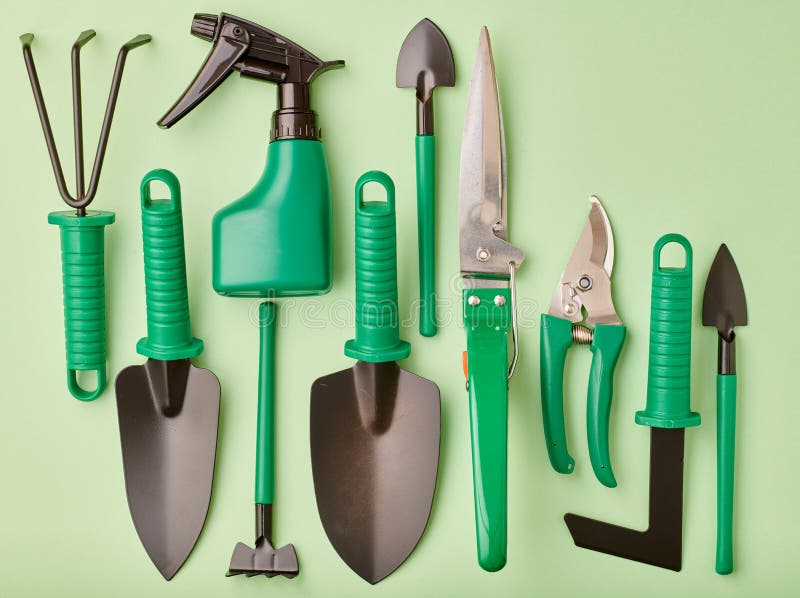 Gardening Tools on Green Background Flat Lay Stock Image - Image of ...