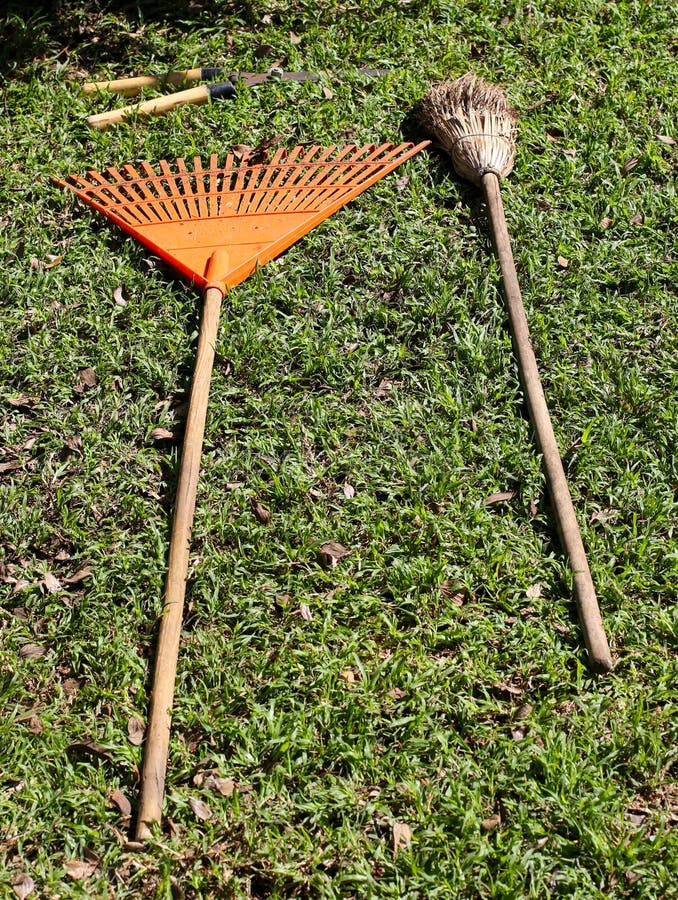 Gardening Tools on a Green Lawn Stock Photo - Image of grass, outdoor ...