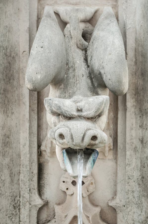 Gargoyle in a Fountain Spitting Water by Mouth Stock Image - Image of ...