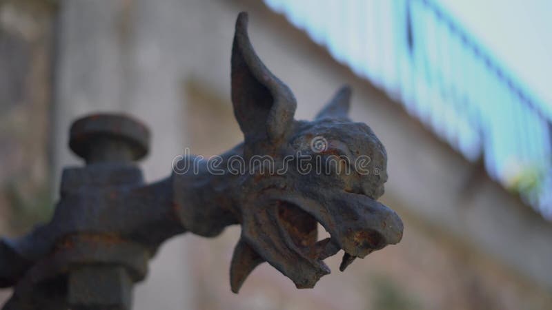 Gargoyle Head Made of Metal. Wall Mount Torch Holder Stock Video ...