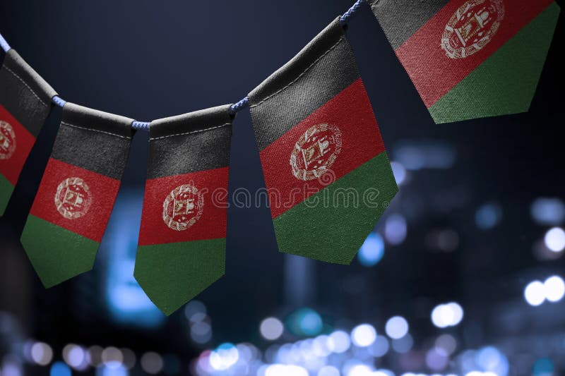 A Garland of Afghanistan National Flags on an Abstract Blurred ...