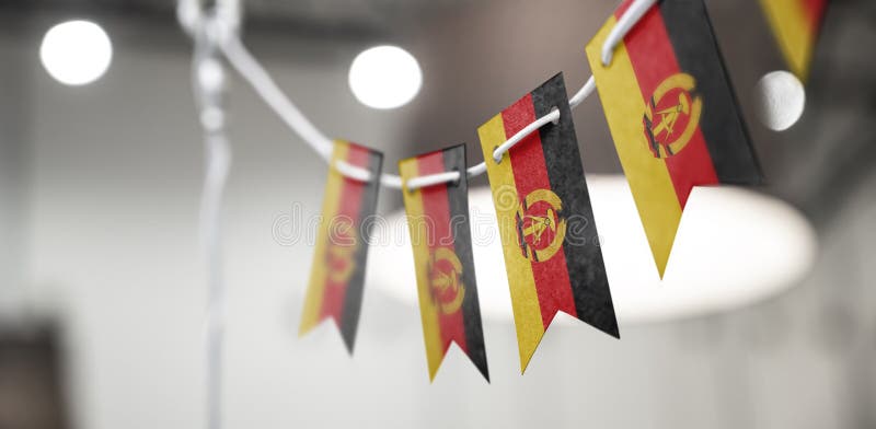 A Garland of GDR National Flags on an Abstract Blurred Background Stock ...