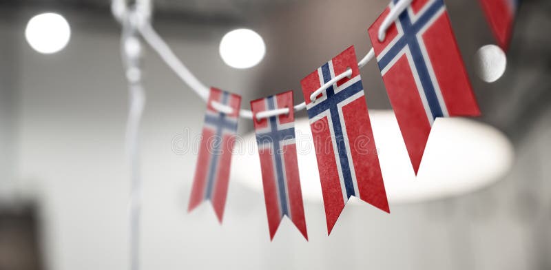 A Garland of Norway National Flags on an Abstract Blurred Background ...