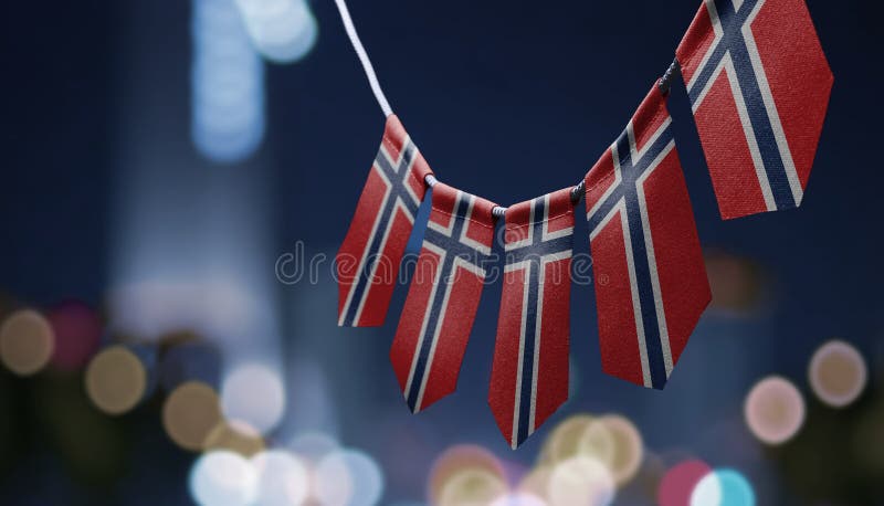 A Garland of Norway National Flags on an Abstract Blurred Background ...