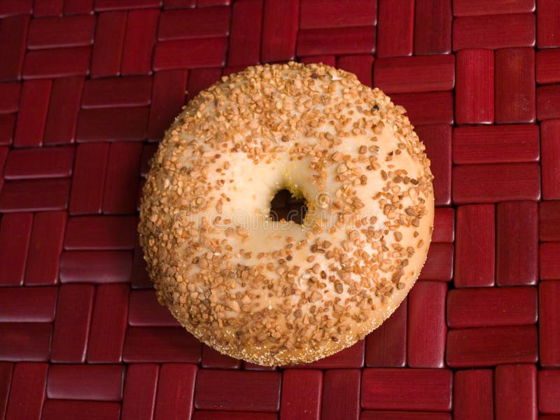 Garlic Bagel on Red stock photo. Image of detail, fabric - 16976262