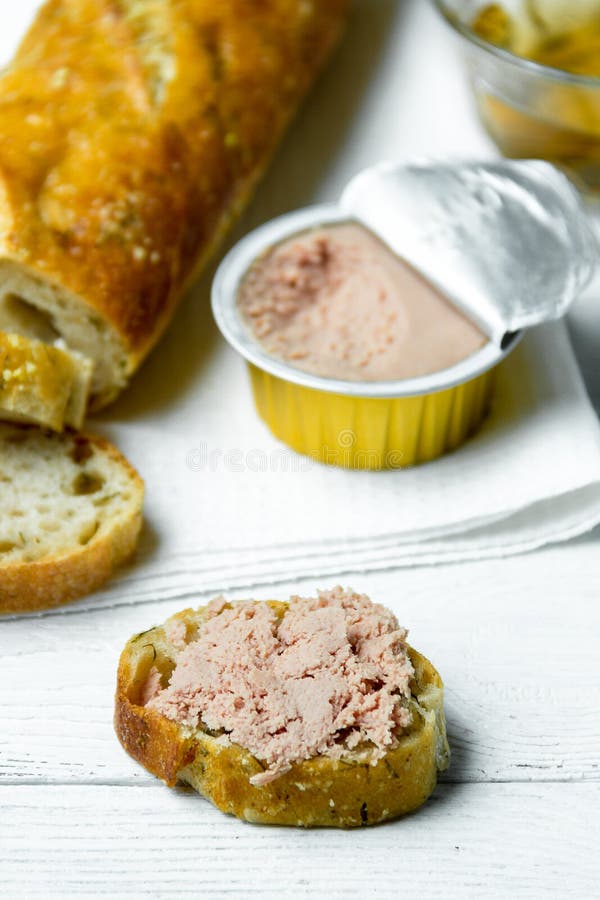 Garlic Baguette with Pate on White Kitchen Towel on Wooden Table. Stock ...
